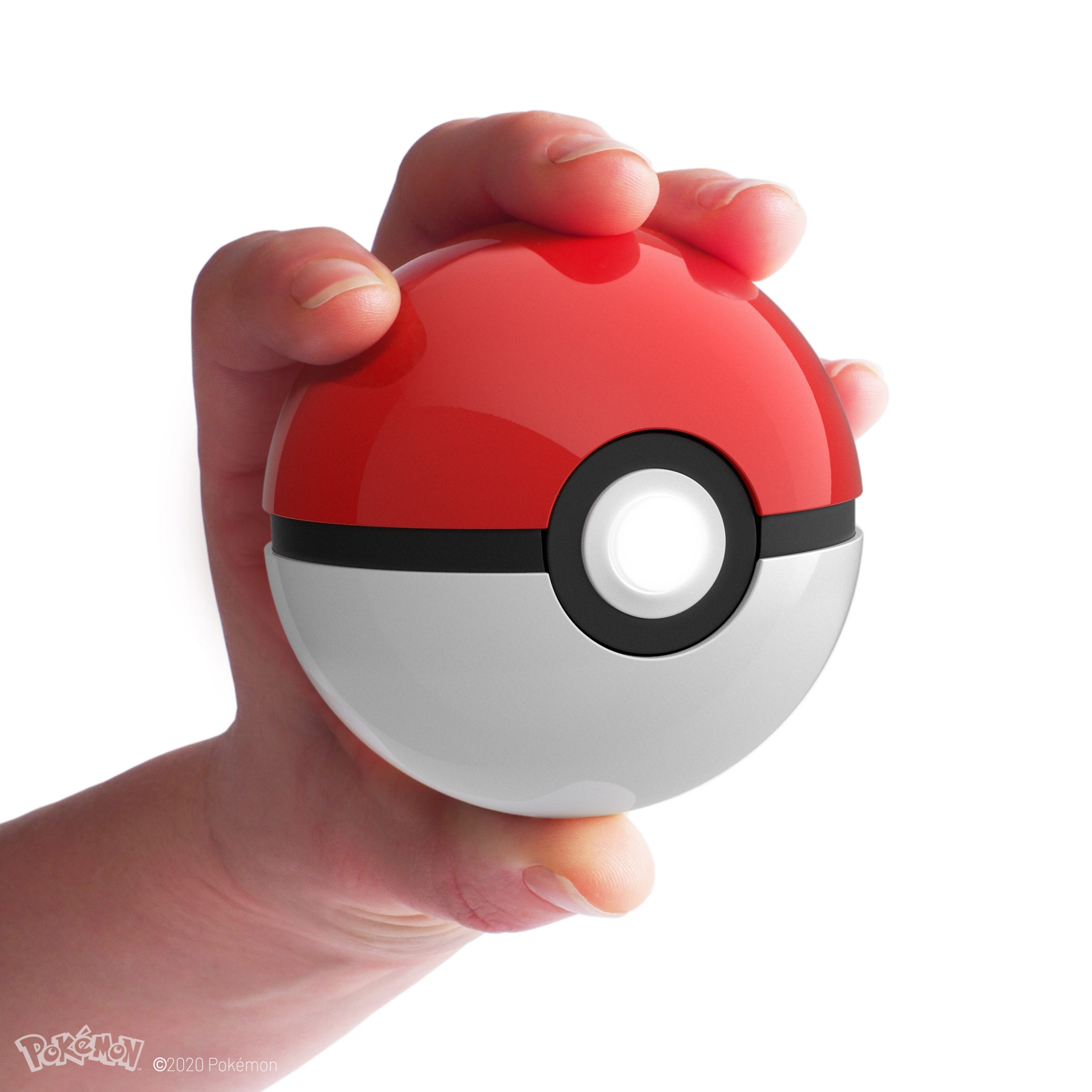 hand-holding-pokeball-lit-B-3400px | The Wand Company